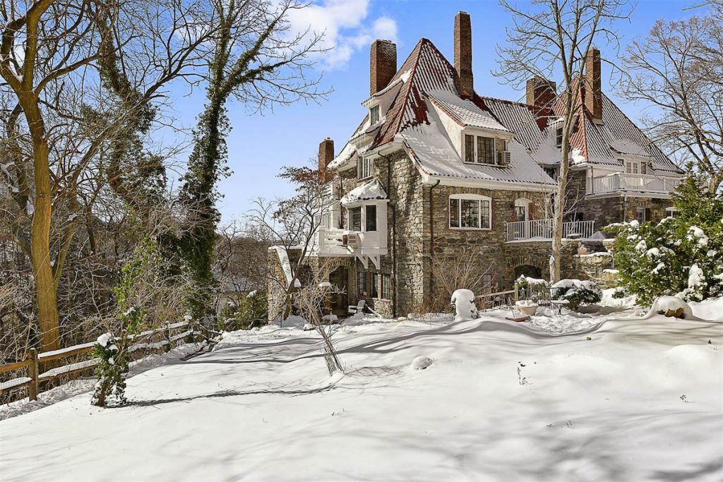 This 1924 cliffside Riverdale castle-cottage has magical river views, a ...