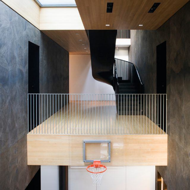 Young Projects used interior gardens to combine three floors at a ...