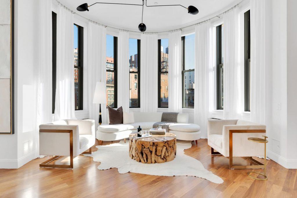 Window-wrapped turrets offer three-way views in this $6M Chelsea aerie ...