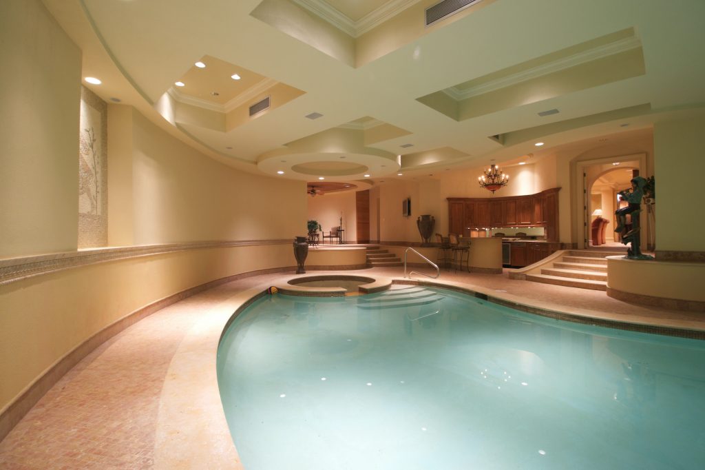 Long Island mansion with an indoor pool and movie theater sells for ...