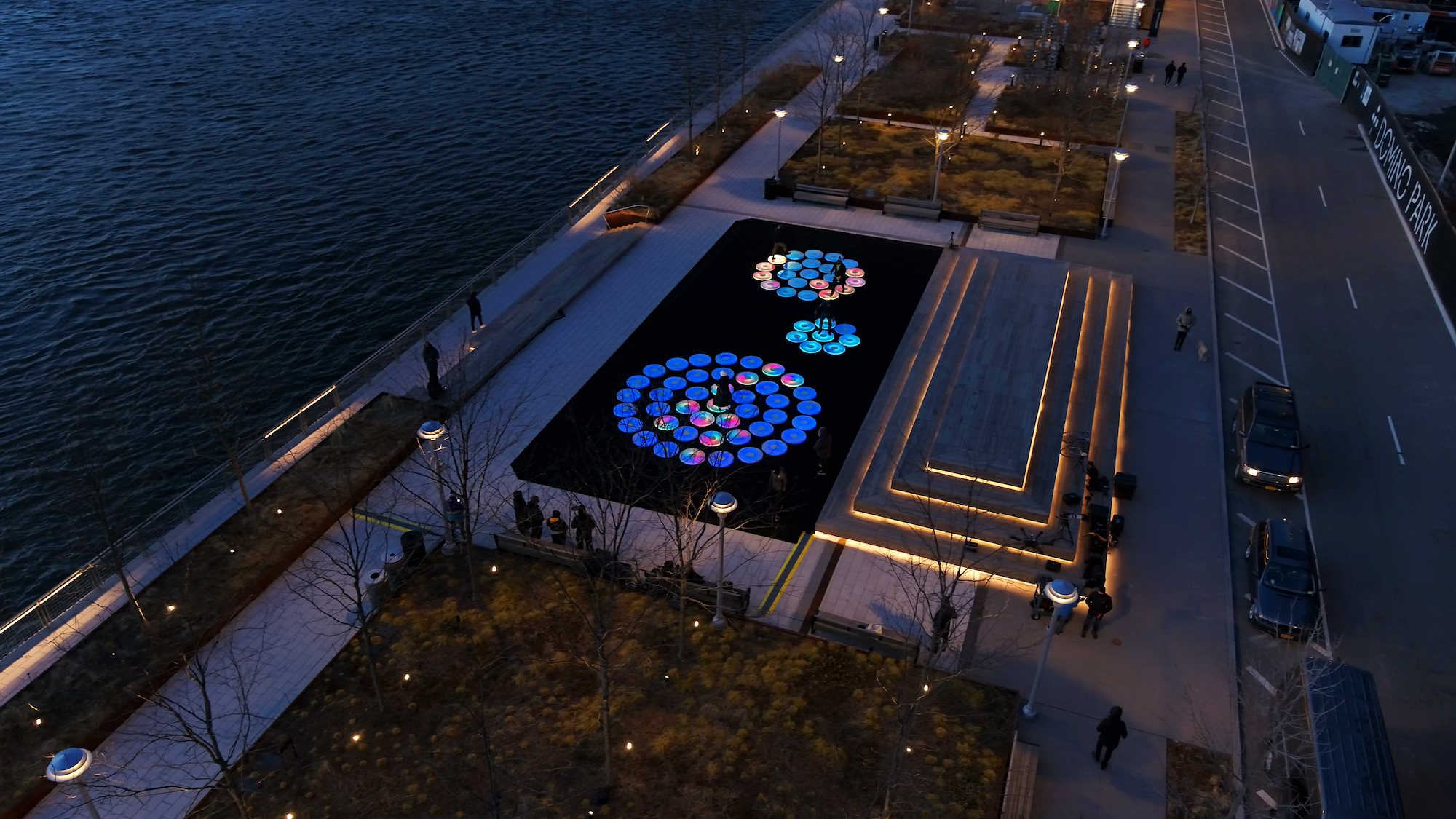 Domino Park unveils interactive art display that lights up when stepped ...