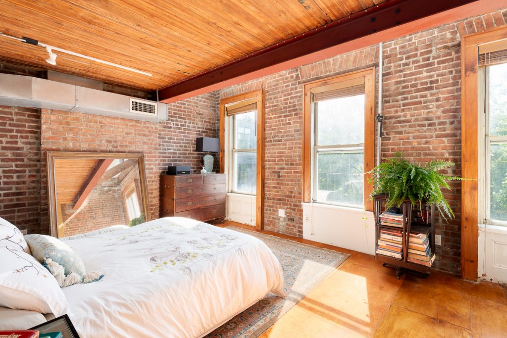 $2.9M Red Hook rowhouse with a live-work setup has rough-hewn details ...