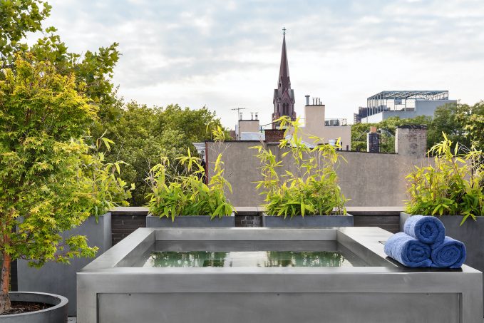 Take the elevator to a rooftop hot tub at this $12.5M designer ...