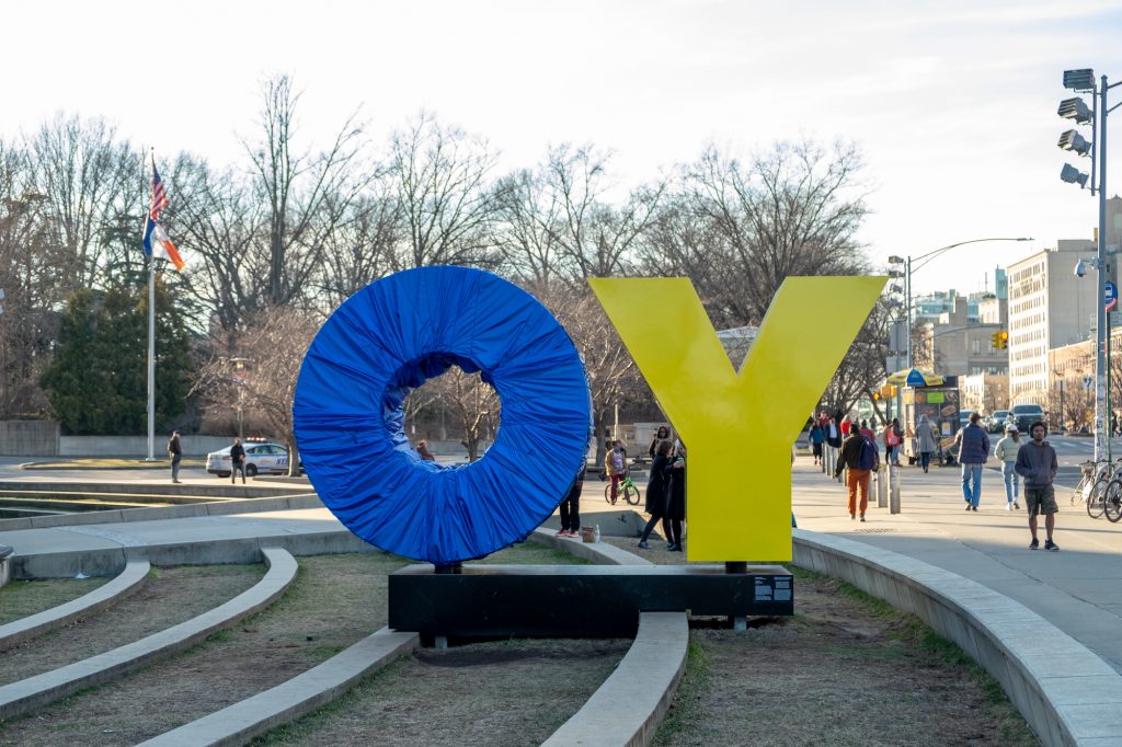 Brooklyn Museum's iconic 'OY/YO' sculpture is wrapped in blue fabric to ...