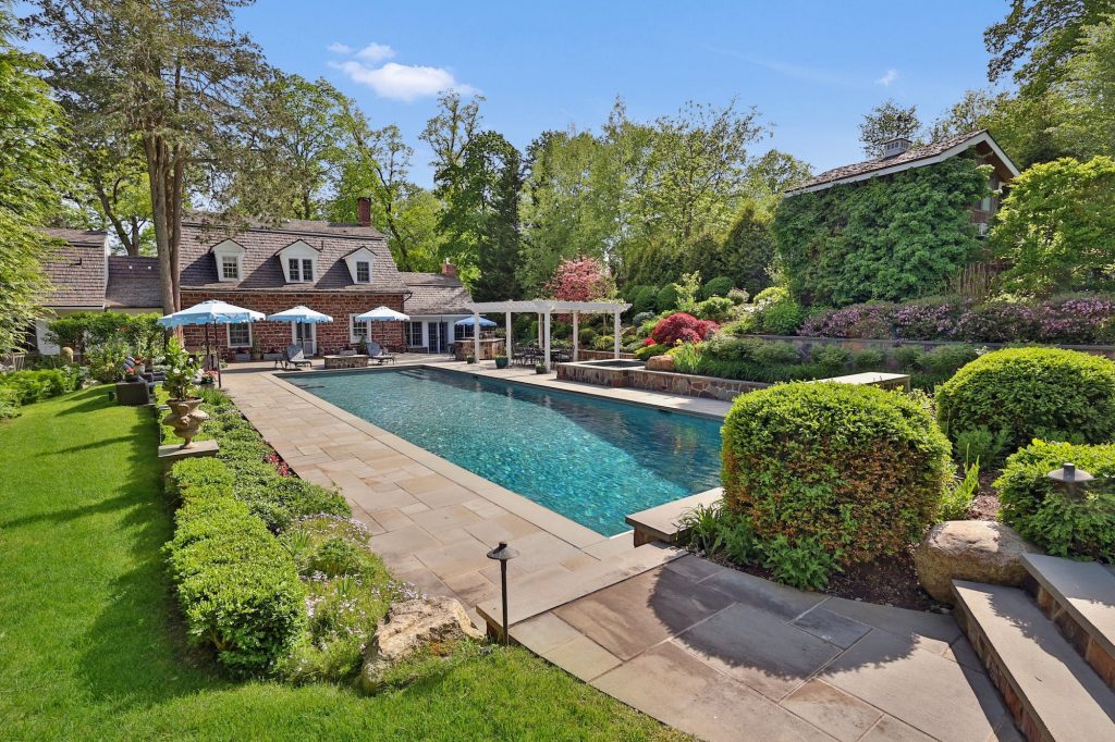 $1.6M upstate Dutch Colonial home is summer-ready with a saltwater pool ...