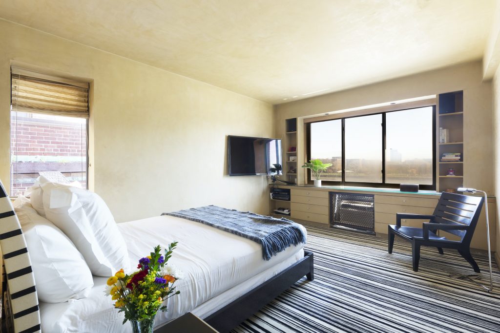 A private waterfront terrace and river views define this sprawling $2 ...