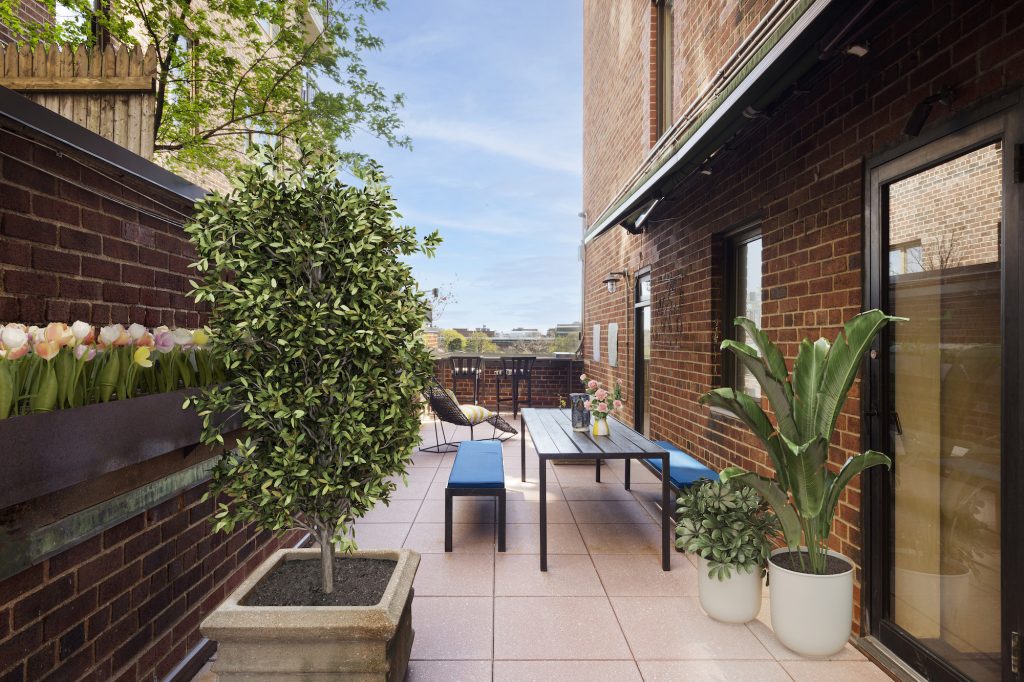 A private waterfront terrace and river views define this sprawling $2 ...