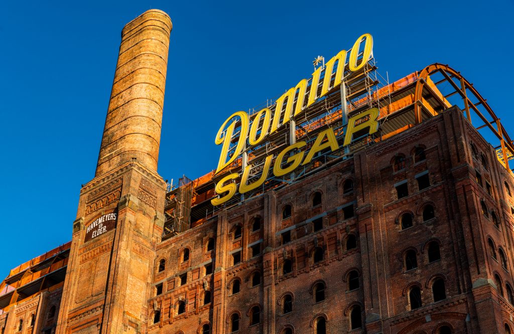 Iconic yellow 'Domino Sugar' sign returns to Brooklyn | 6sqft